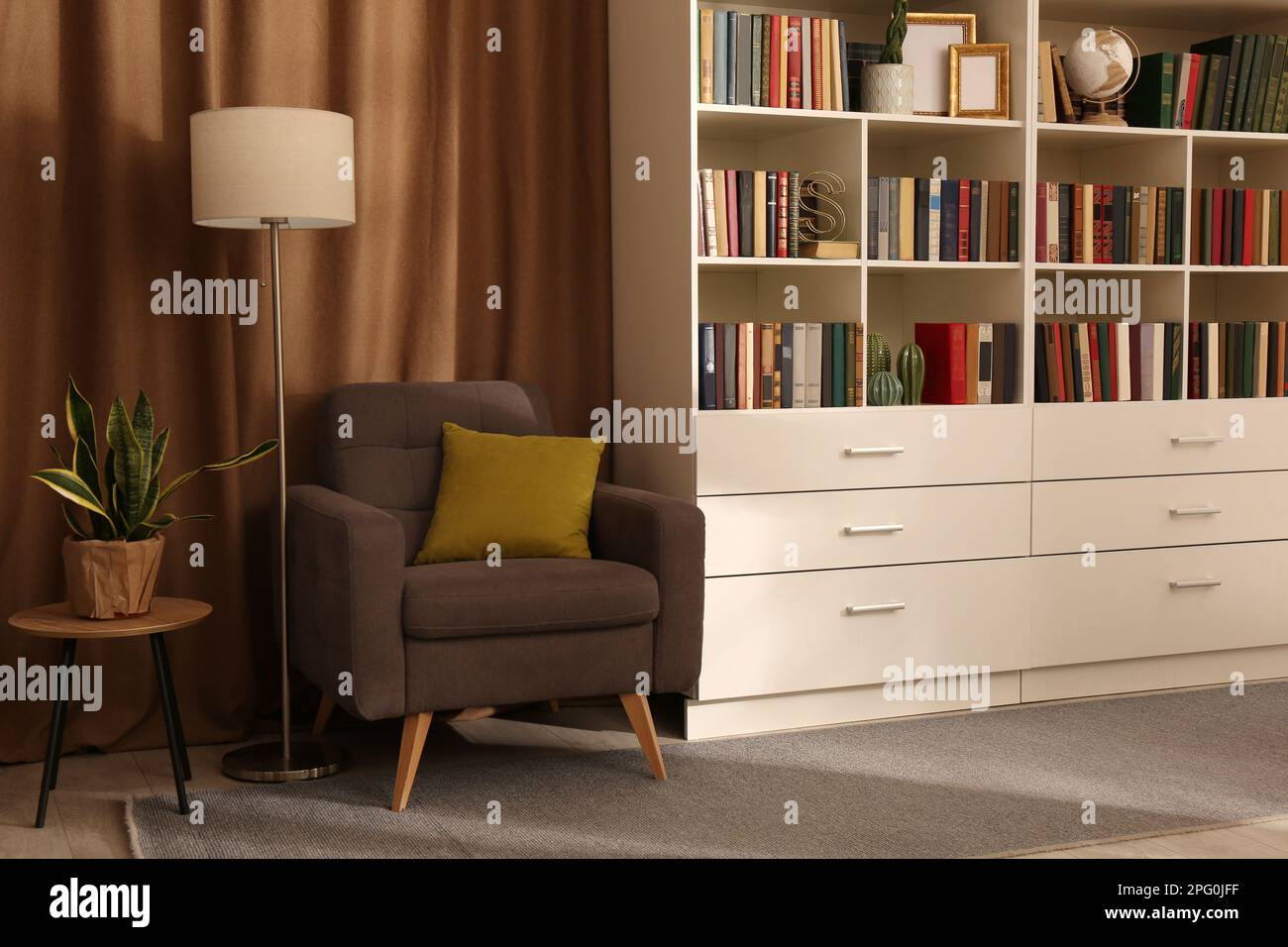 Cozy home library interior with collection of different books on ...