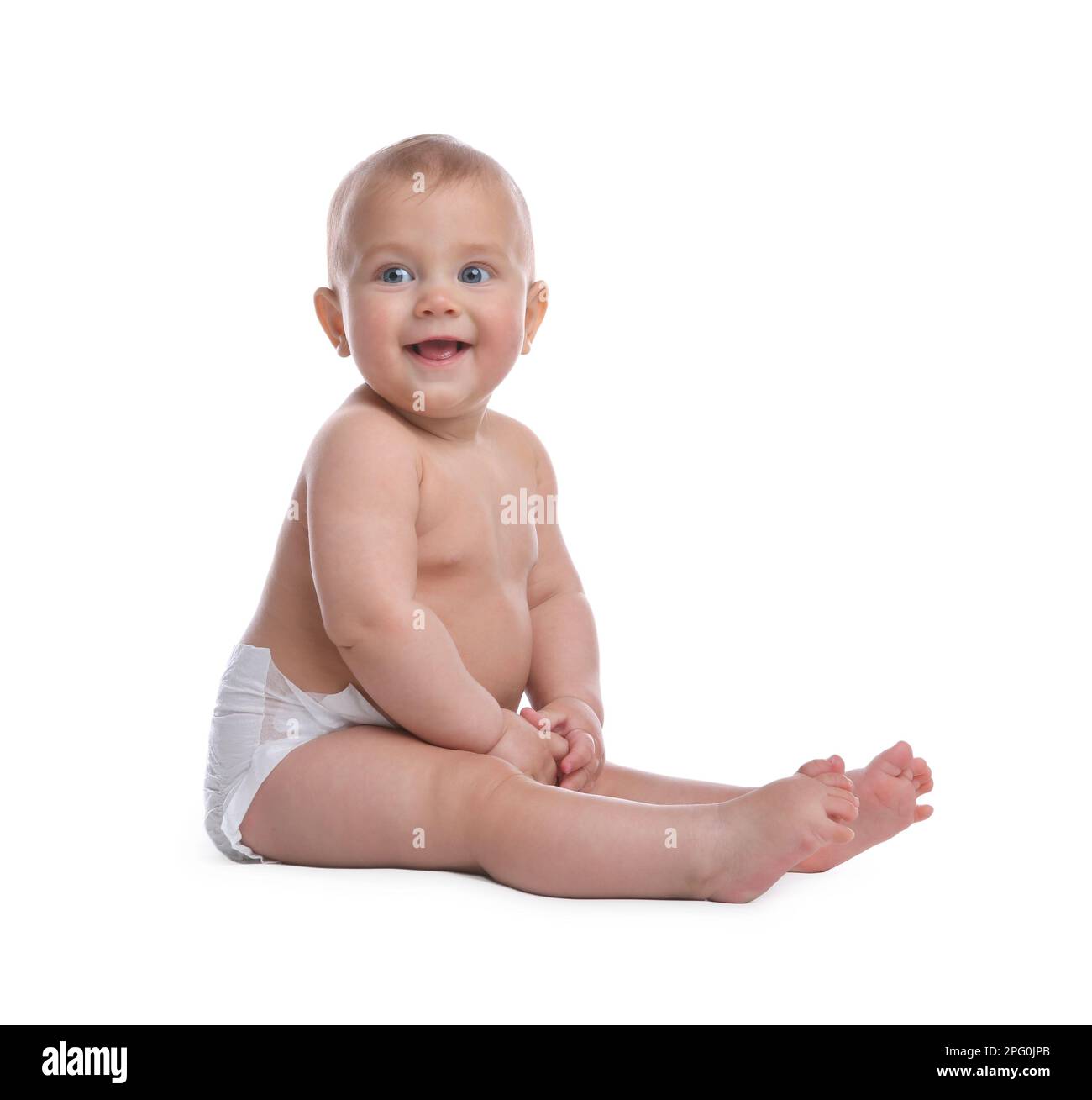 Cute baby in dry soft diaper sitting on white background Stock Photo ...