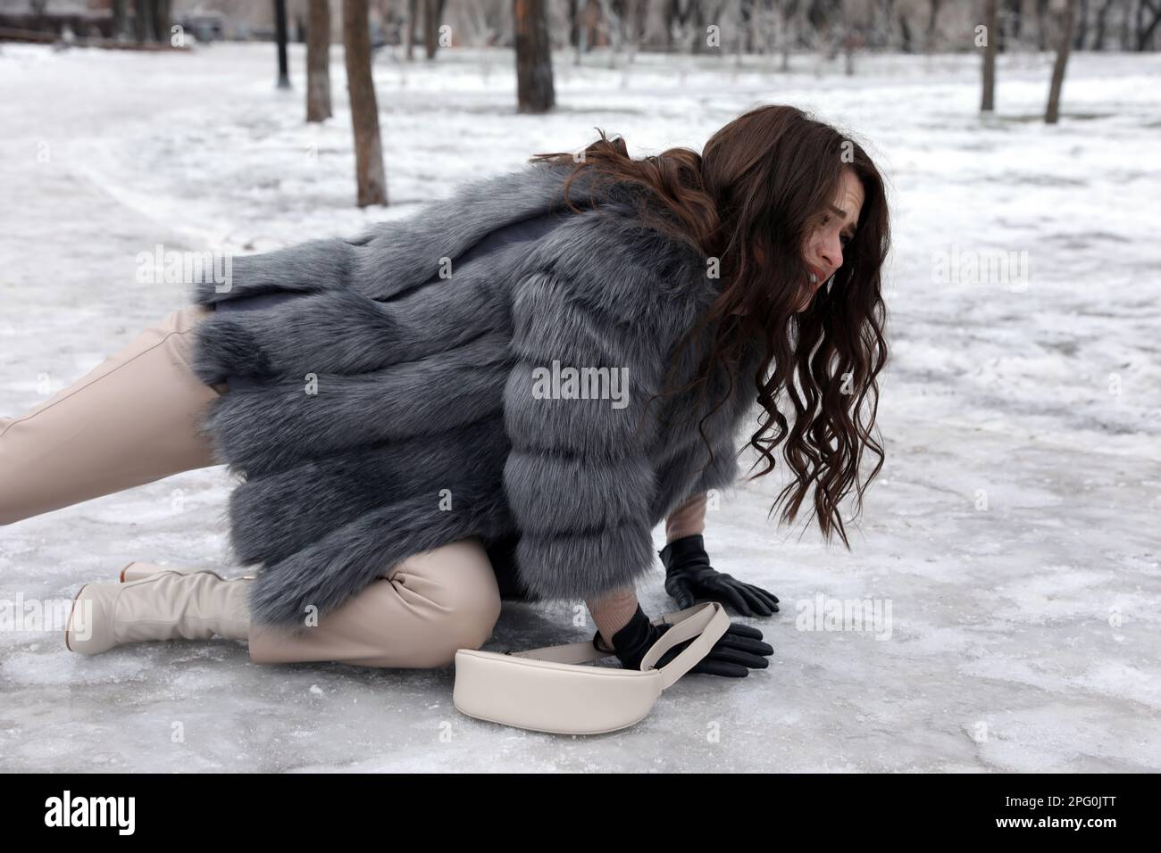 Woman slipping pavement hi-res stock photography and images - Alamy
