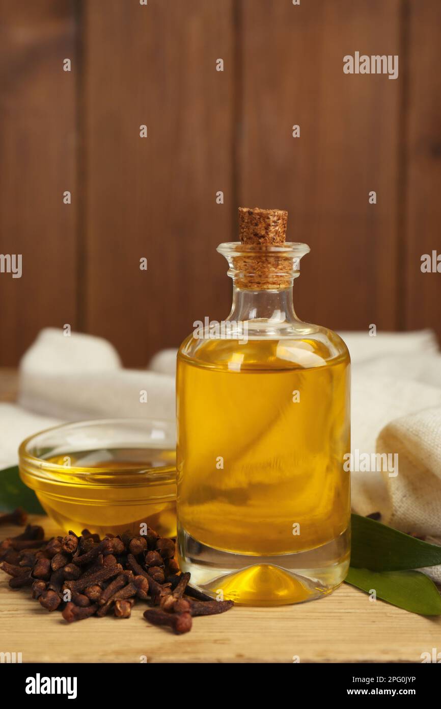 Cloves and leaf with essential oil hi-res stock photography and images ...