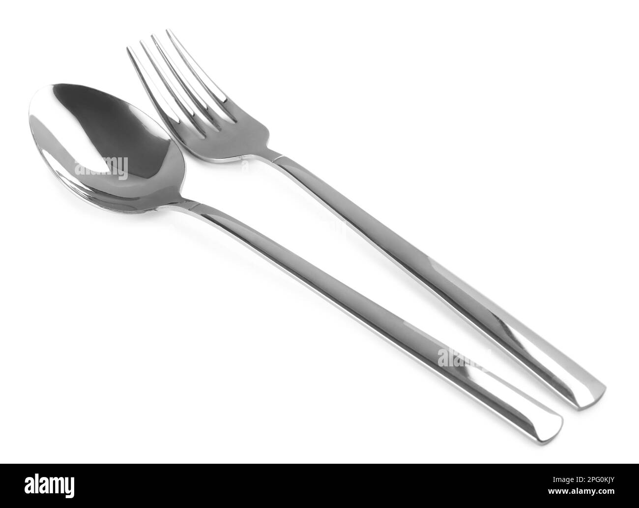 New shiny fork and spoon on white background Stock Photo - Alamy