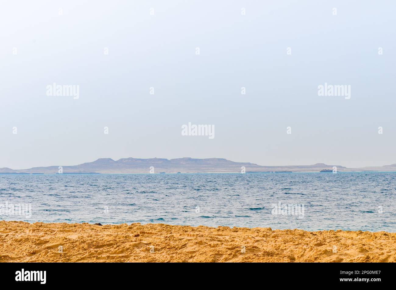 Inland sea at Al-Adaid Desert in Qatar with limestone hills in the ...