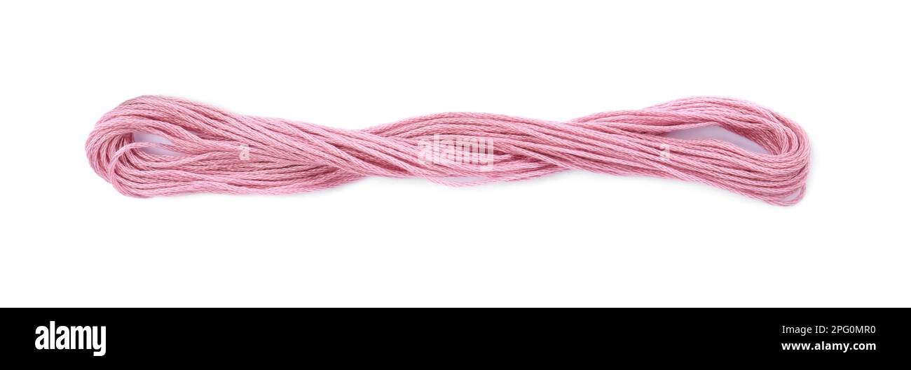 Pale pink embroidery thread on white background, top view Stock Photo ...