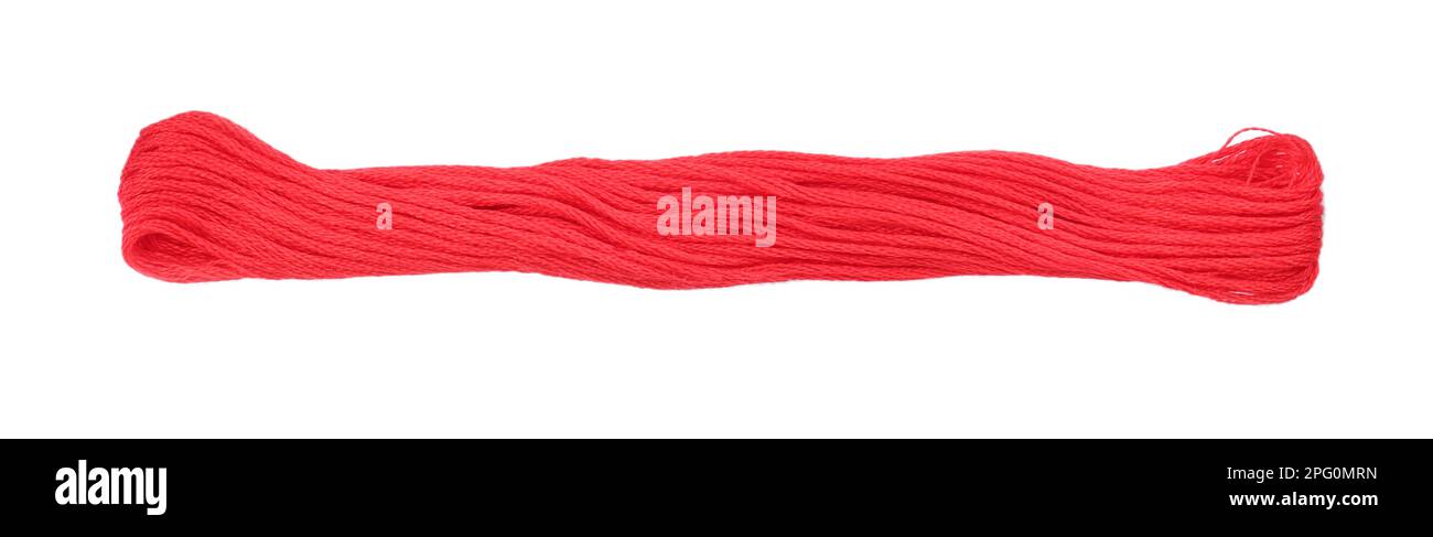 Light crimson embroidery thread on white background Stock Photo - Alamy