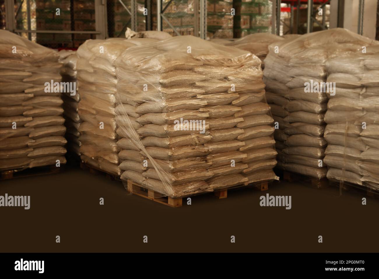 Warehouse with stacks of bags on wooden pallets. Wholesaling Stock ...