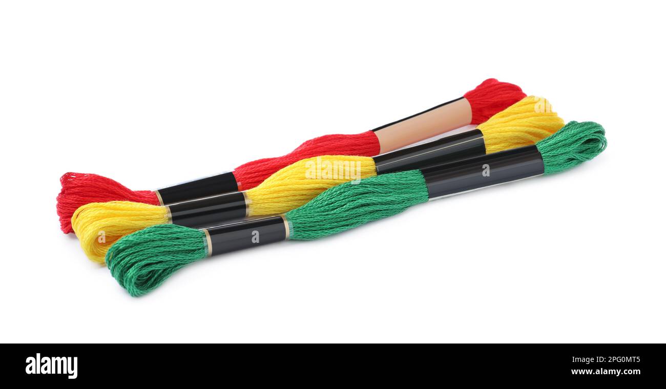 Set of colorful embroidery threads on white background Stock Photo - Alamy