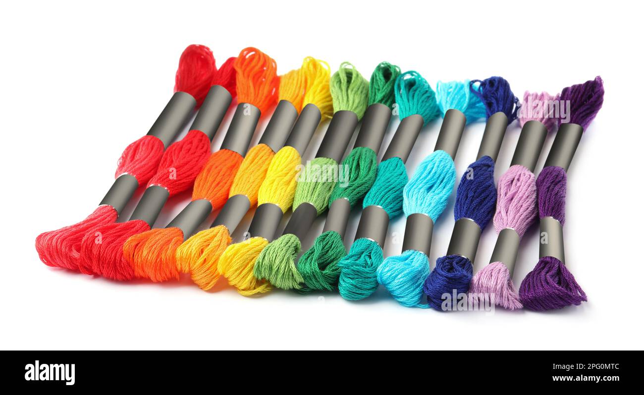 Set of colorful embroidery threads on white background Stock Photo - Alamy