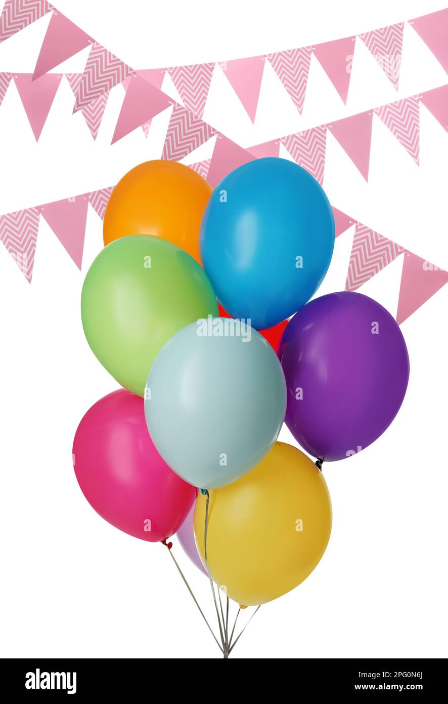 Colorful balloons and decorative bunting flags on white background ...