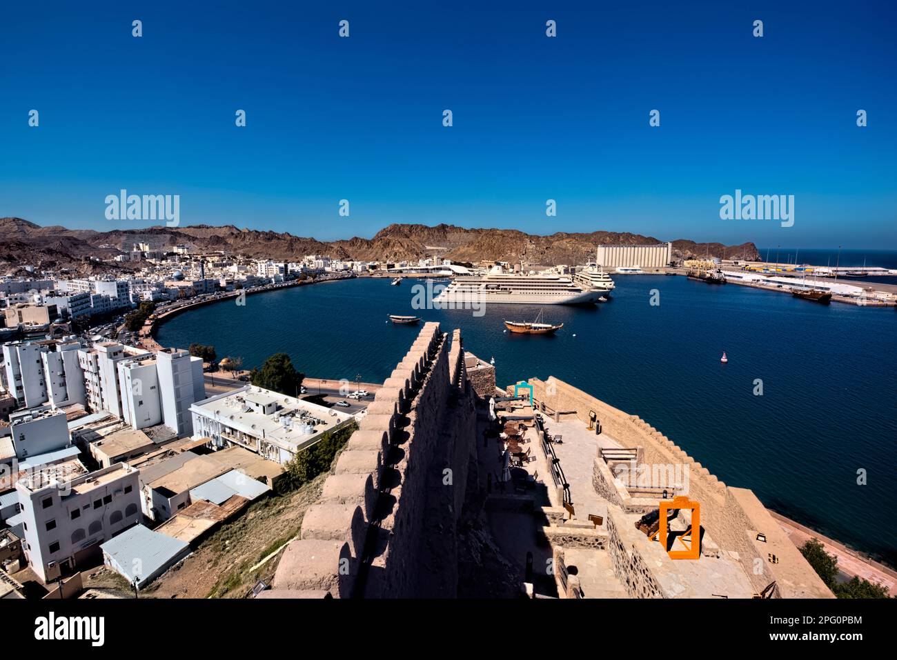 View of the corniche and Mutrah Harbor from the old fort and watch ...