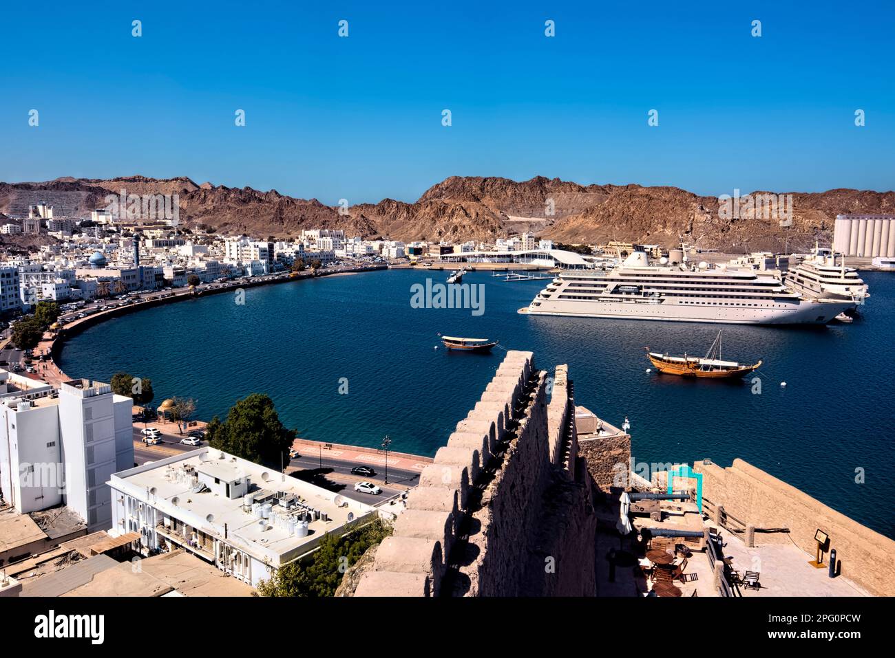 View of the corniche and Mutrah Harbor from the old fort and watch ...