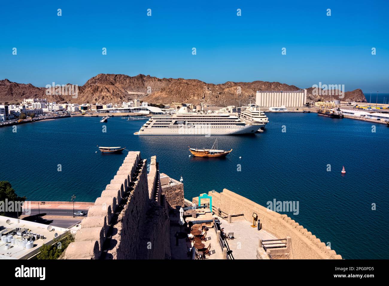 View of the corniche and Mutrah Harbor from the old fort and watch ...