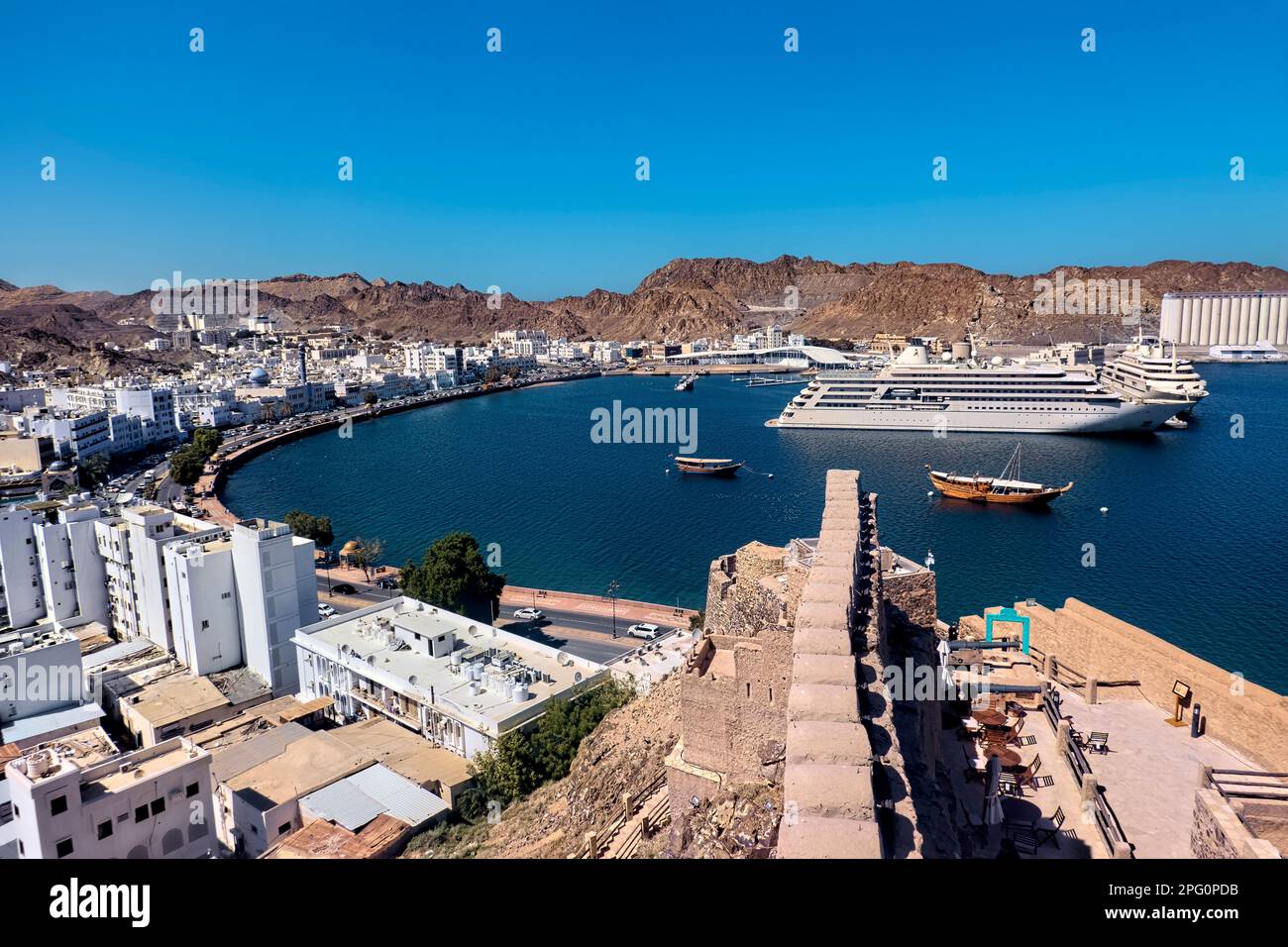 View of the corniche and Mutrah Harbor from the old fort and watch ...