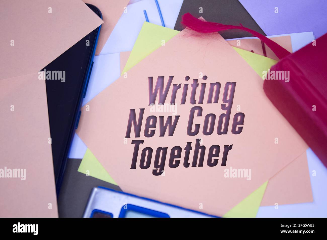 Writing New Code Together. Text on adhesive note paper. Event ...
