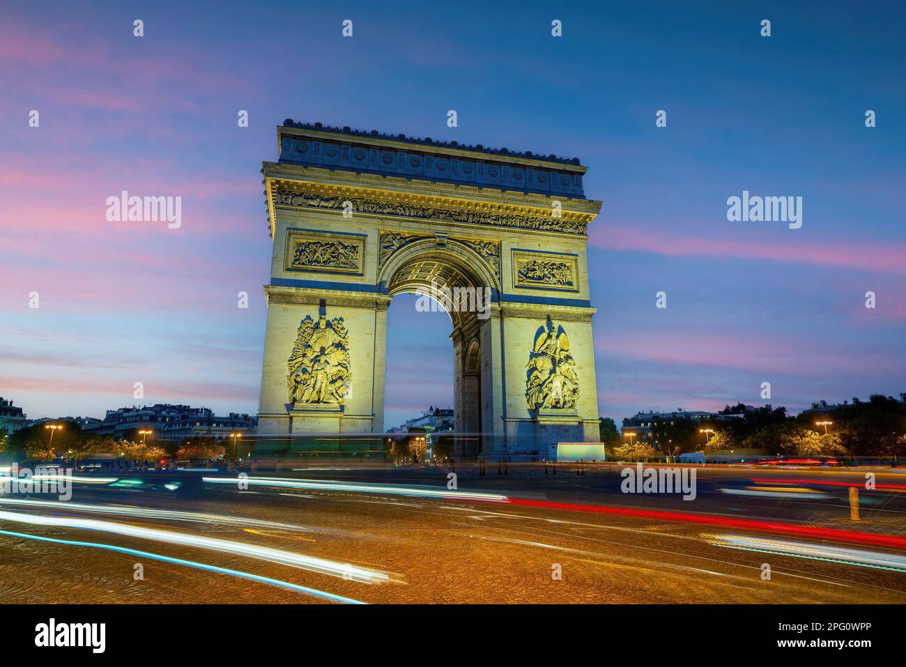 Arc de Triomphe in downtown Paris at sunset Stock Photo - Alamy