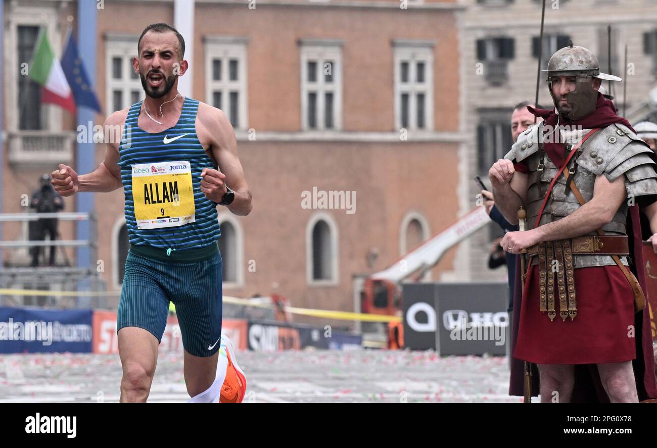 Rome, Italy. 19th Mar, 2023. Taoufik Allam (L) of Morocco reacts after crossing the finish line ...