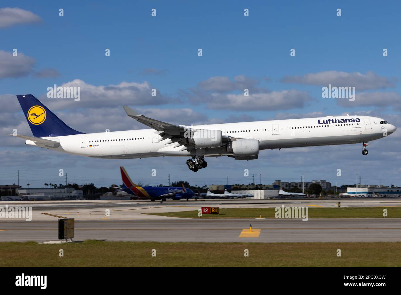 Lufthansa A340-600 landing in Miami MIA Stock Photo - Alamy