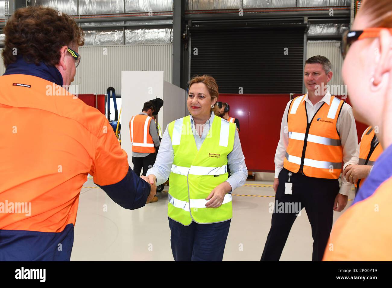 Queensland Premier Annastacia Palaszczuk talks to staff as she visits ...