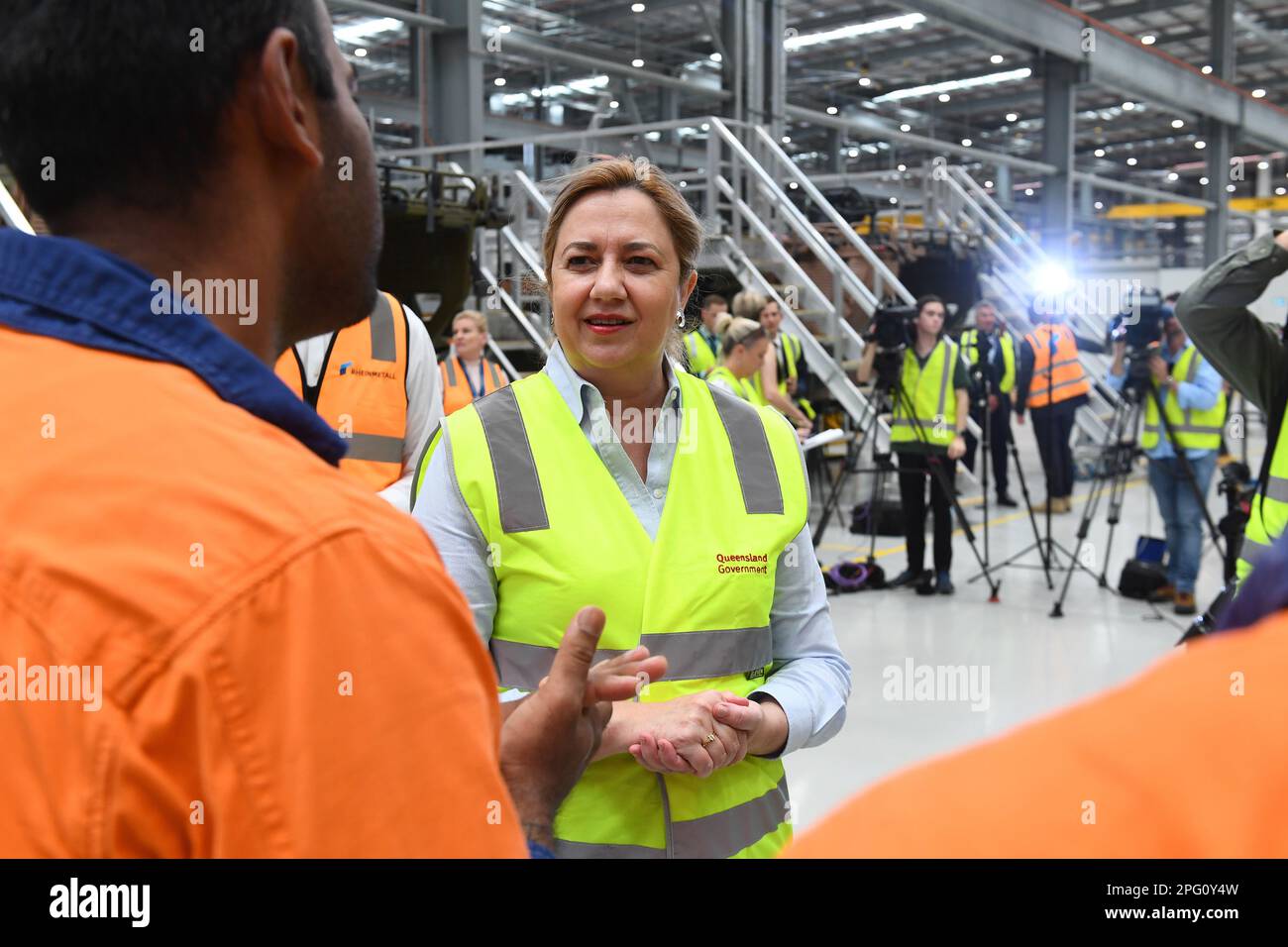Queensland Premier Annastacia Palaszczuk talks to staff as she visits ...