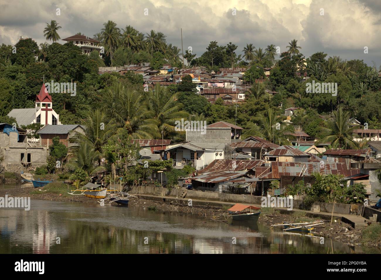 Settlements, a church building and hilly landscape are photographed in ...
