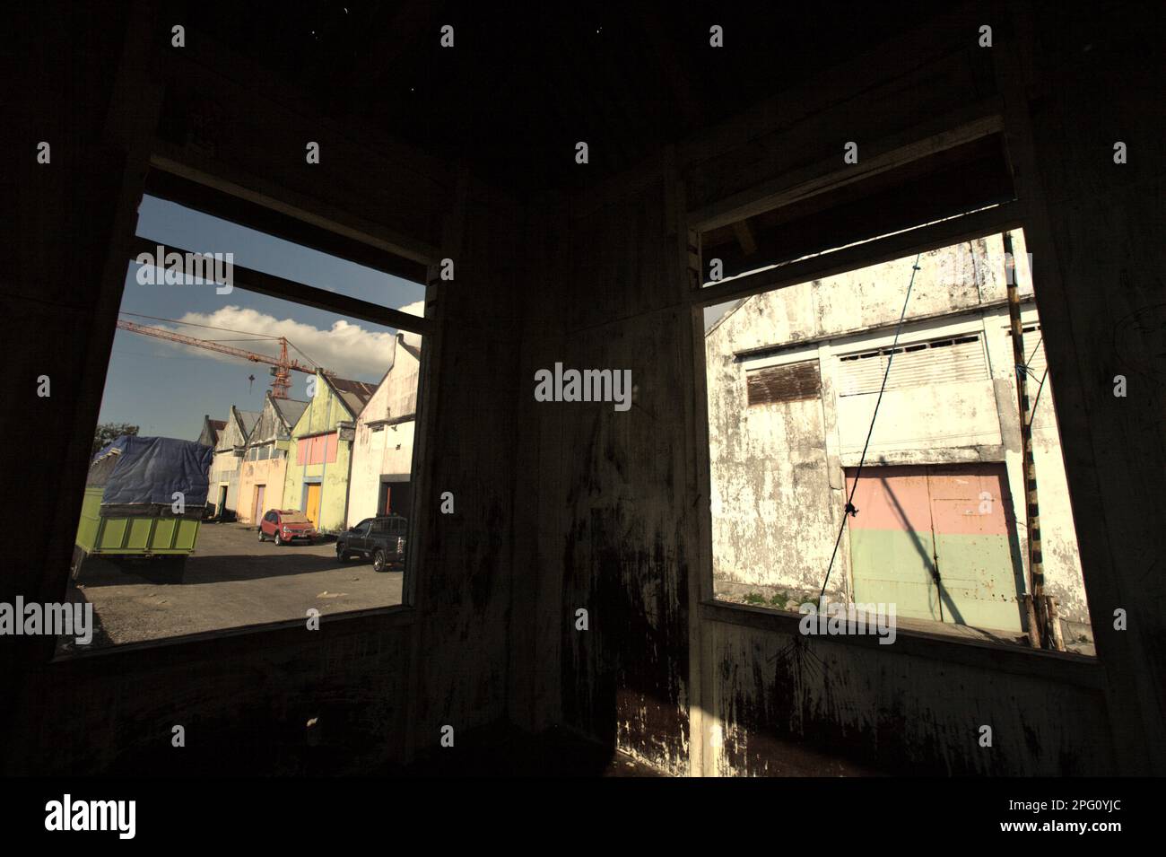 Warehouse buildings at seaport in the coastal city of Manado, North ...