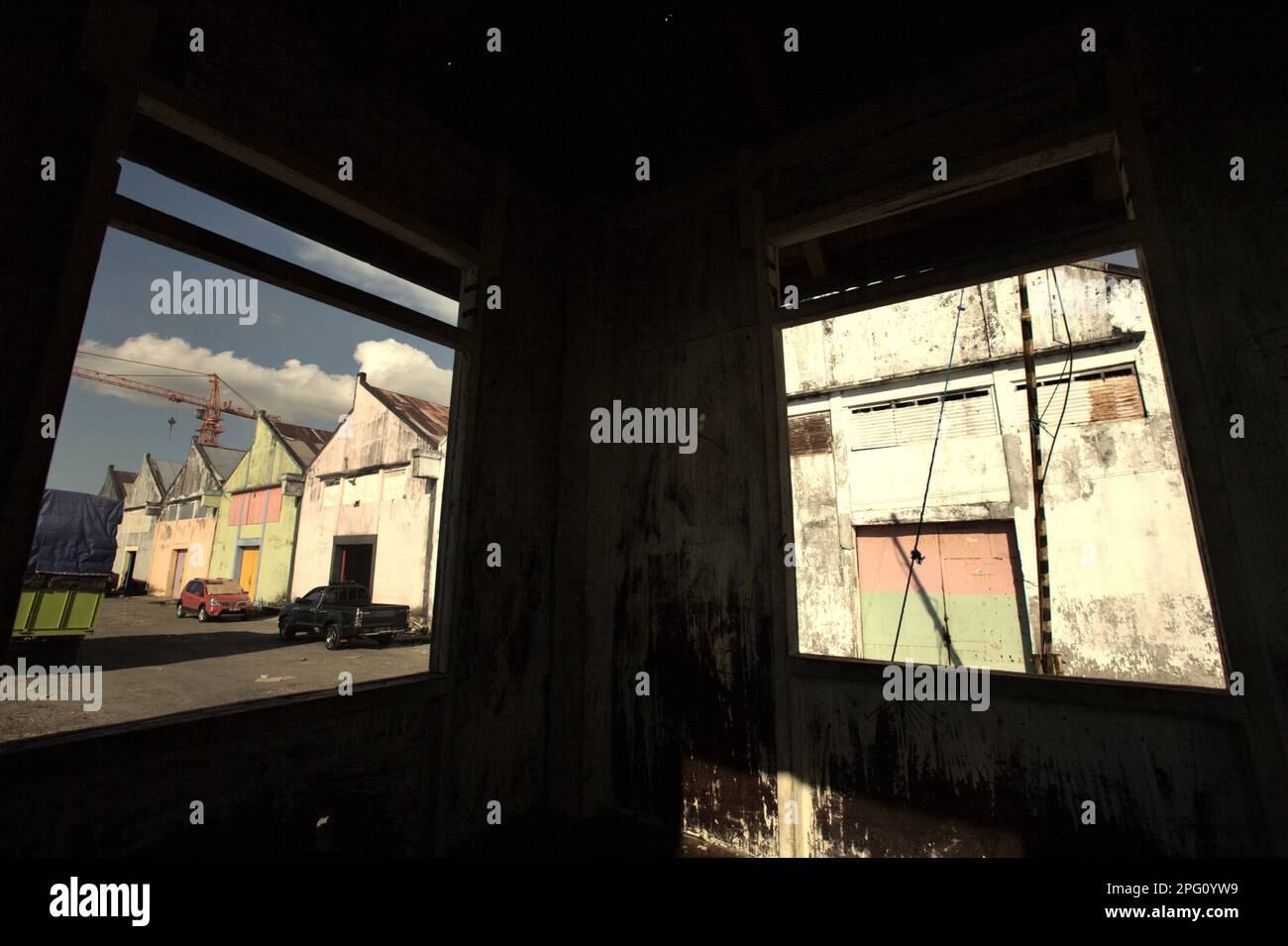 Warehouse buildings at seaport in the coastal city of Manado, North ...