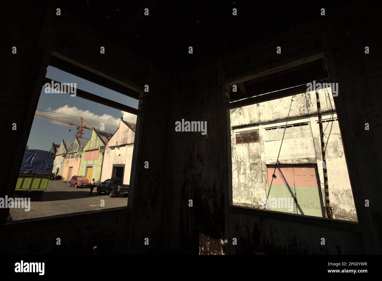 Warehouse buildings at seaport in the coastal city of Manado, North ...