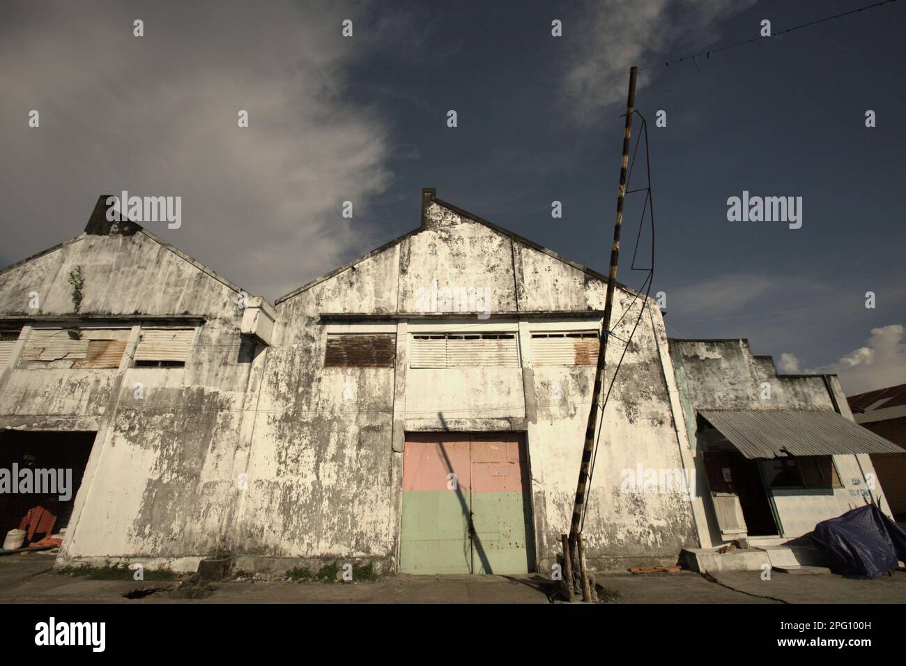 Warehouse buildings at seaport in the coastal city of Manado, North ...