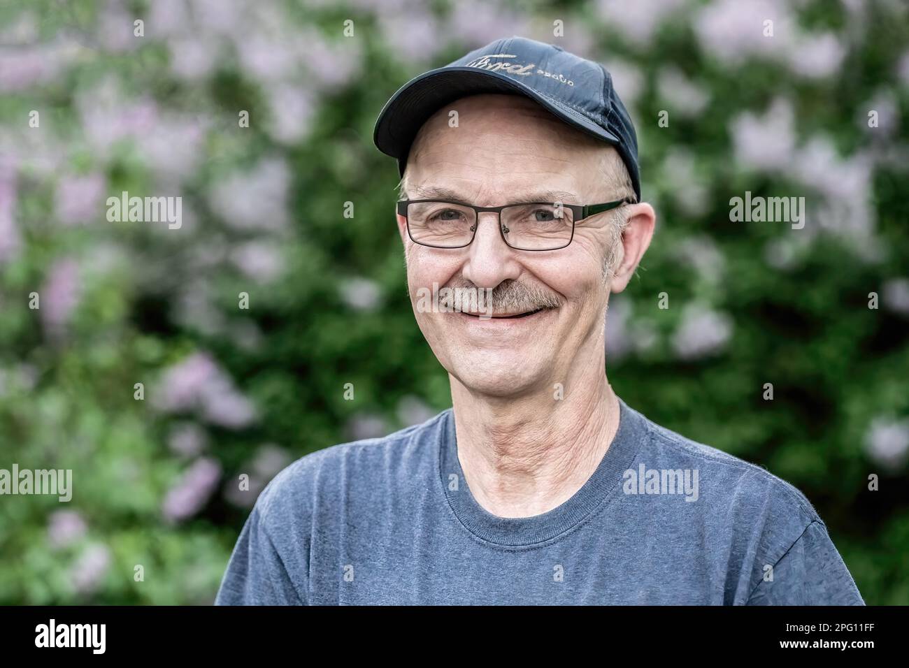 Nice portrait of a happy older senior gentleman who likes Ford ...