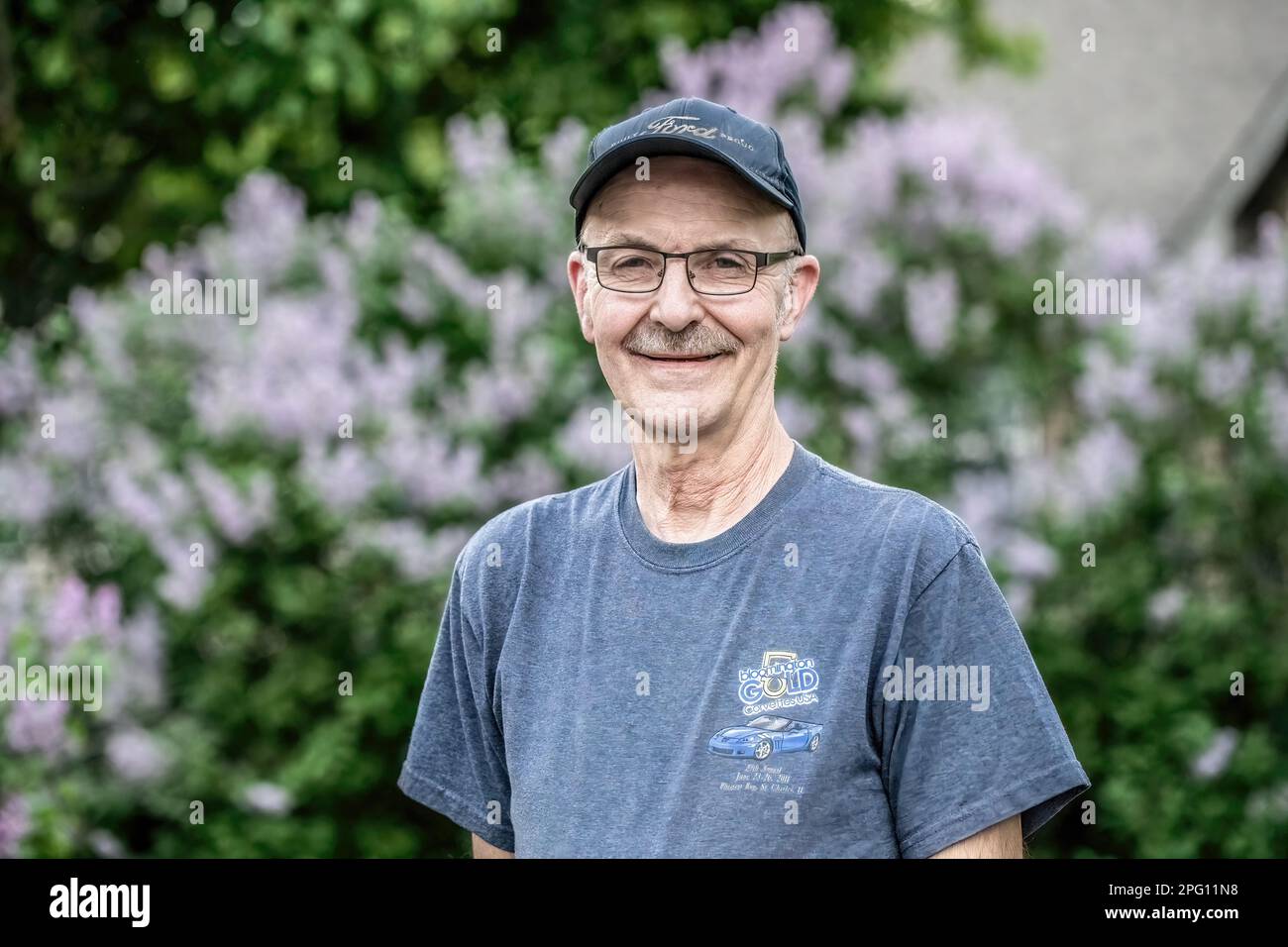 Nice portrait of a happy older senior gentleman who likes Ford ...