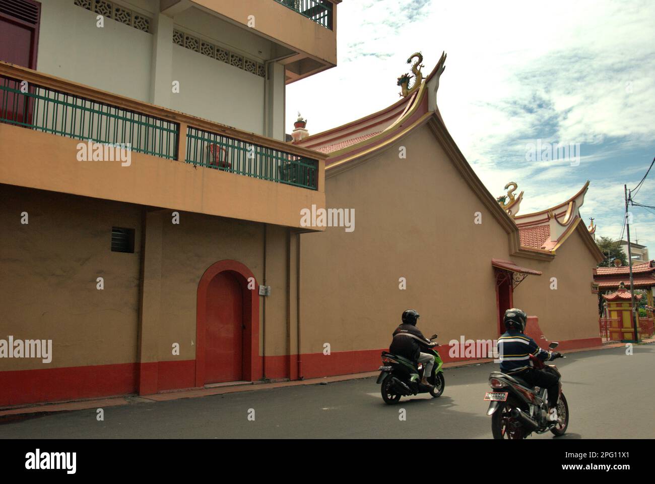 Traffic on a street in chinatown area in Manado City, North Sulawesi ...