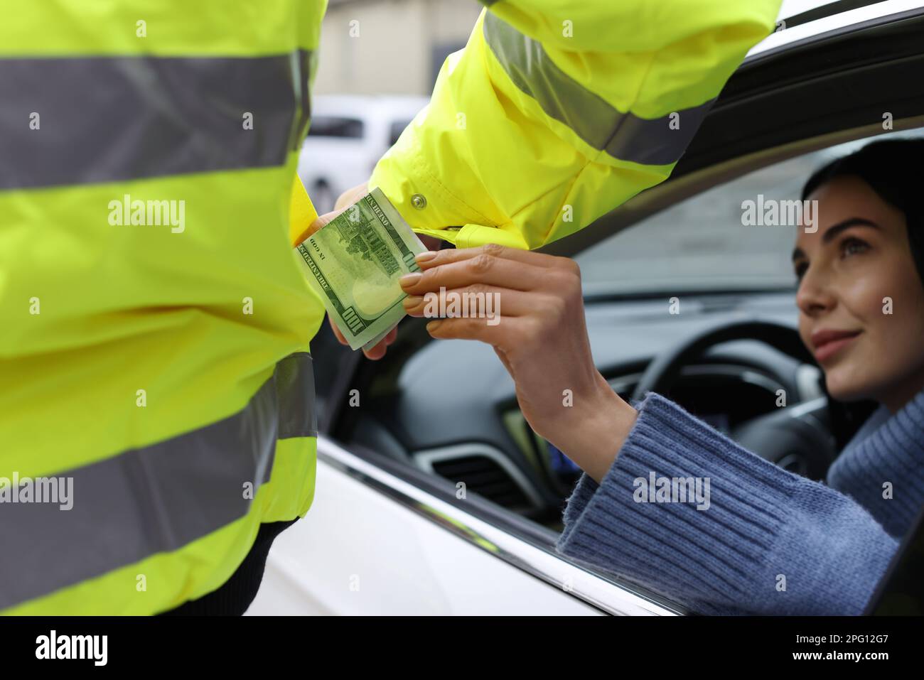 Female driver hands police officer hi-res stock photography and images ...
