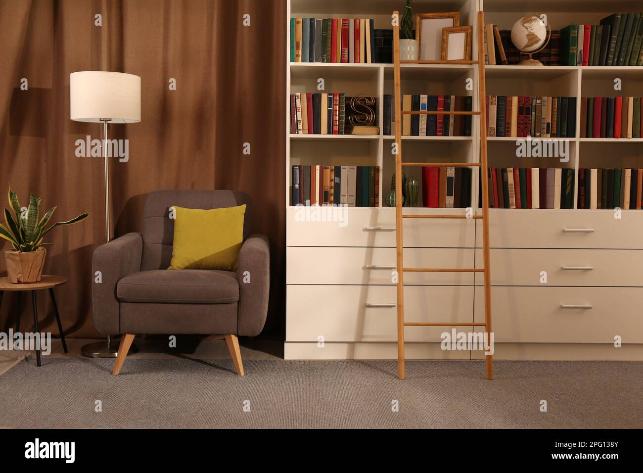 Cozy home library interior with collection of different books on ...