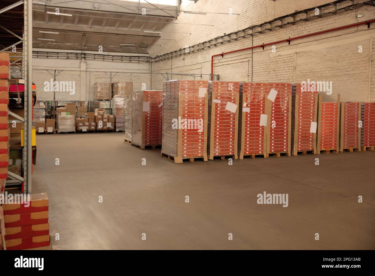Warehouse with lots of products. Wholesale business Stock Photo - Alamy