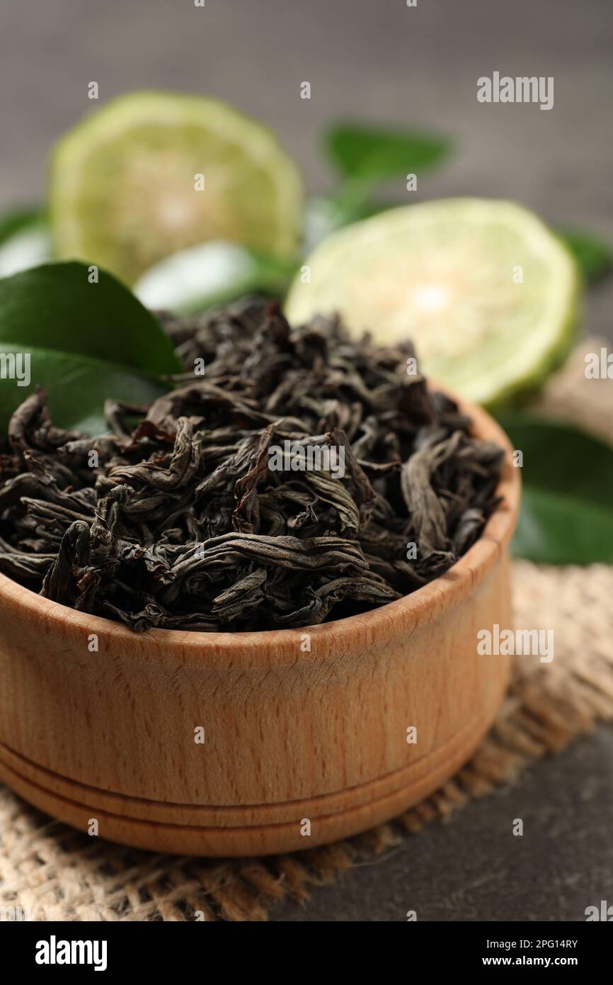 Dry bergamot tea leaves on grey table, closeup Stock Photo - Alamy