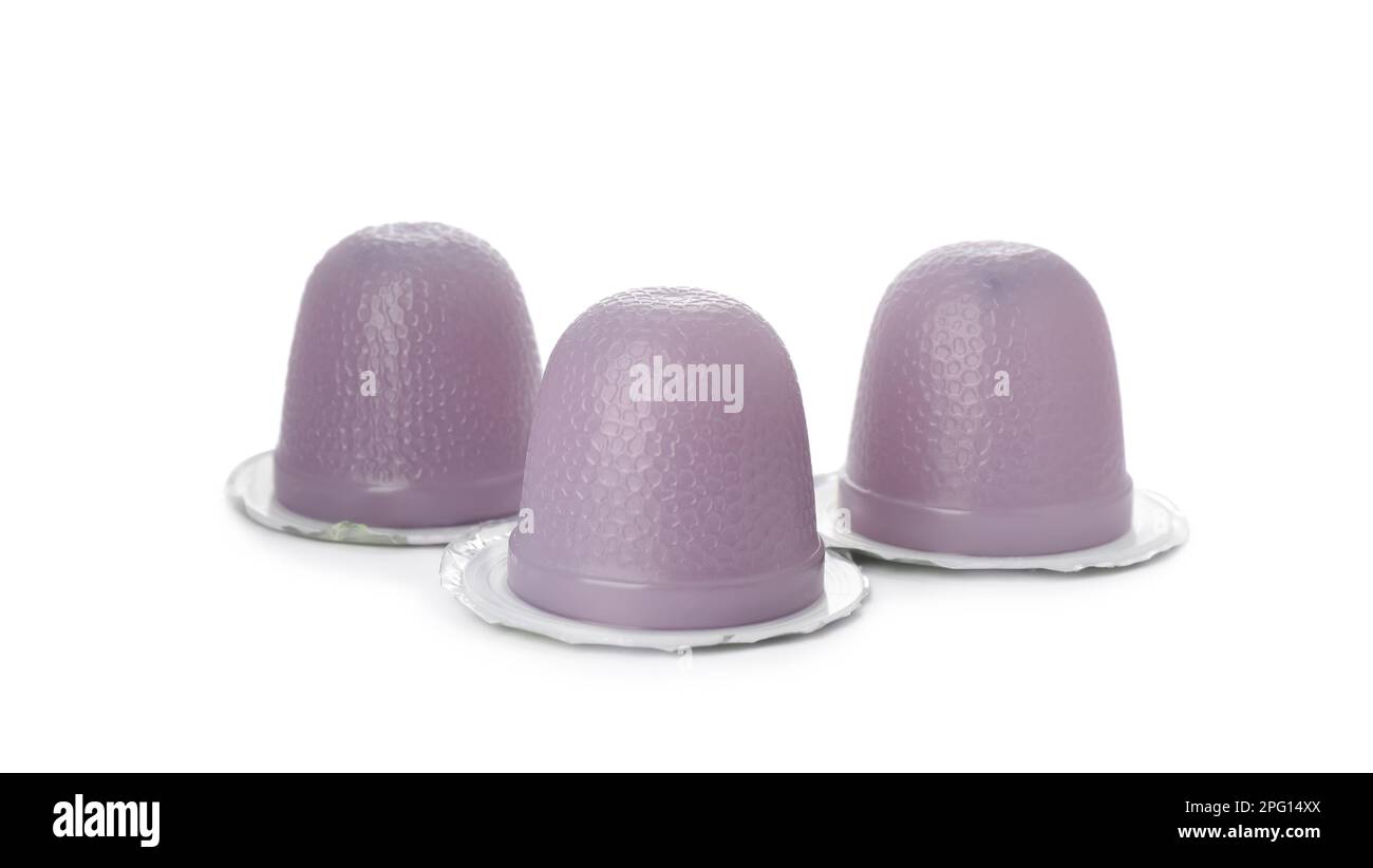 Delicious violet jelly cups on white background Stock Photo - Alamy