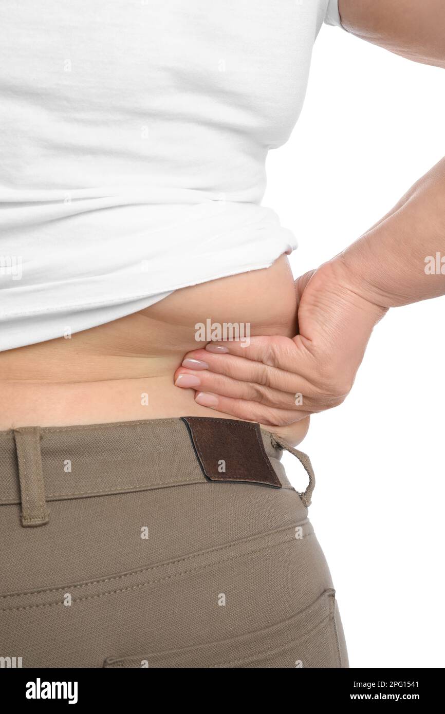 Overweight woman in tight shirt and trousers on white background ...