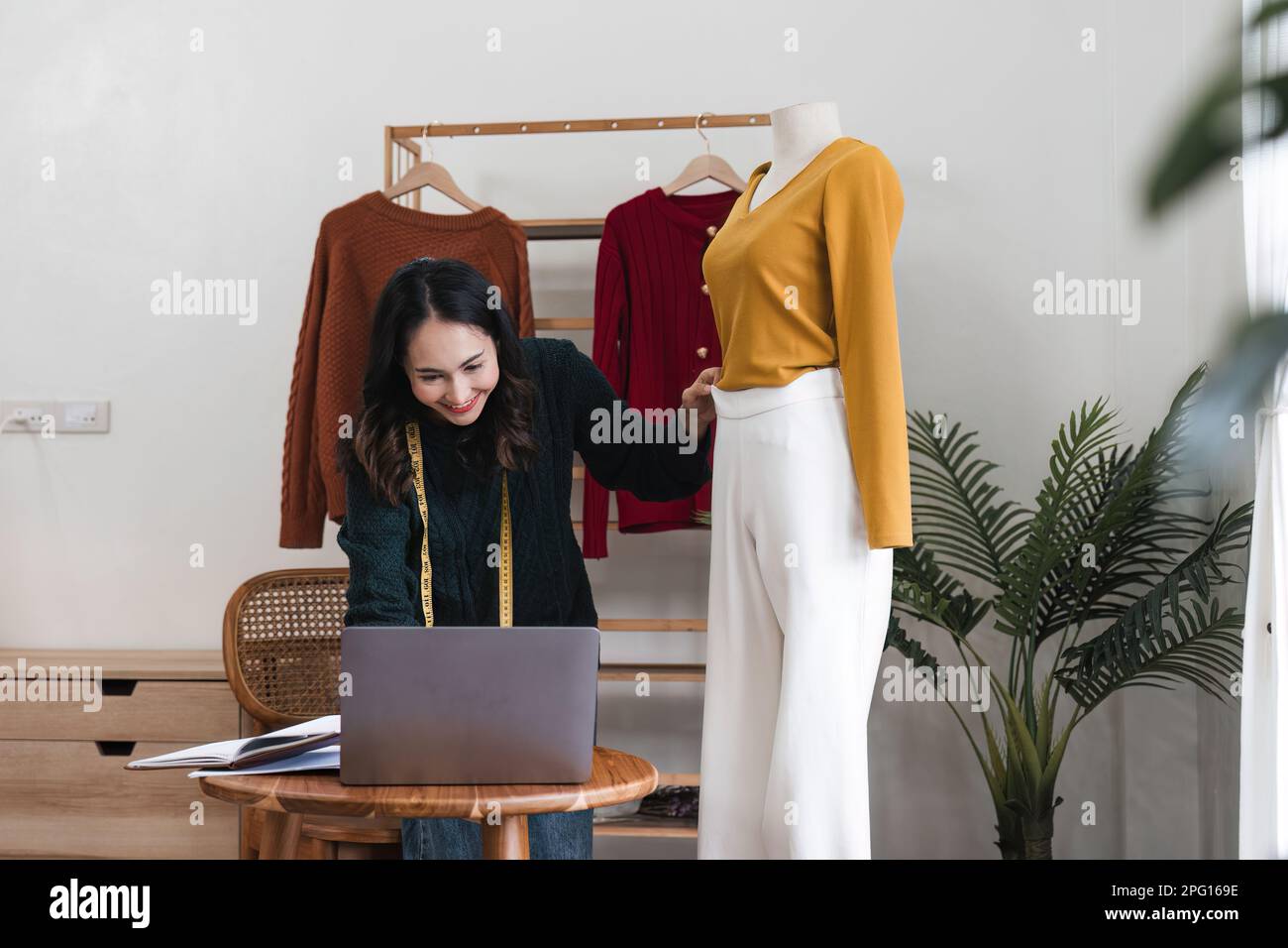 Female stylist Successful Fashion Business. Portrait of Smiling Asian ...