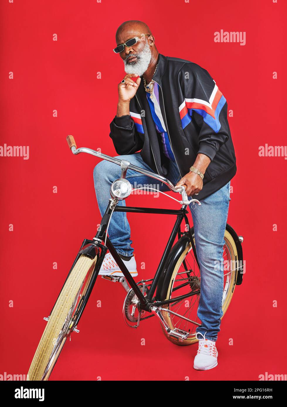 Lets take a ride down memory lane. a senior man sitting on a vintage ...