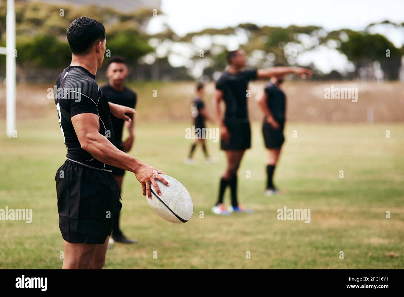 And so the rugby season begins. a group of young men playing a game of ...