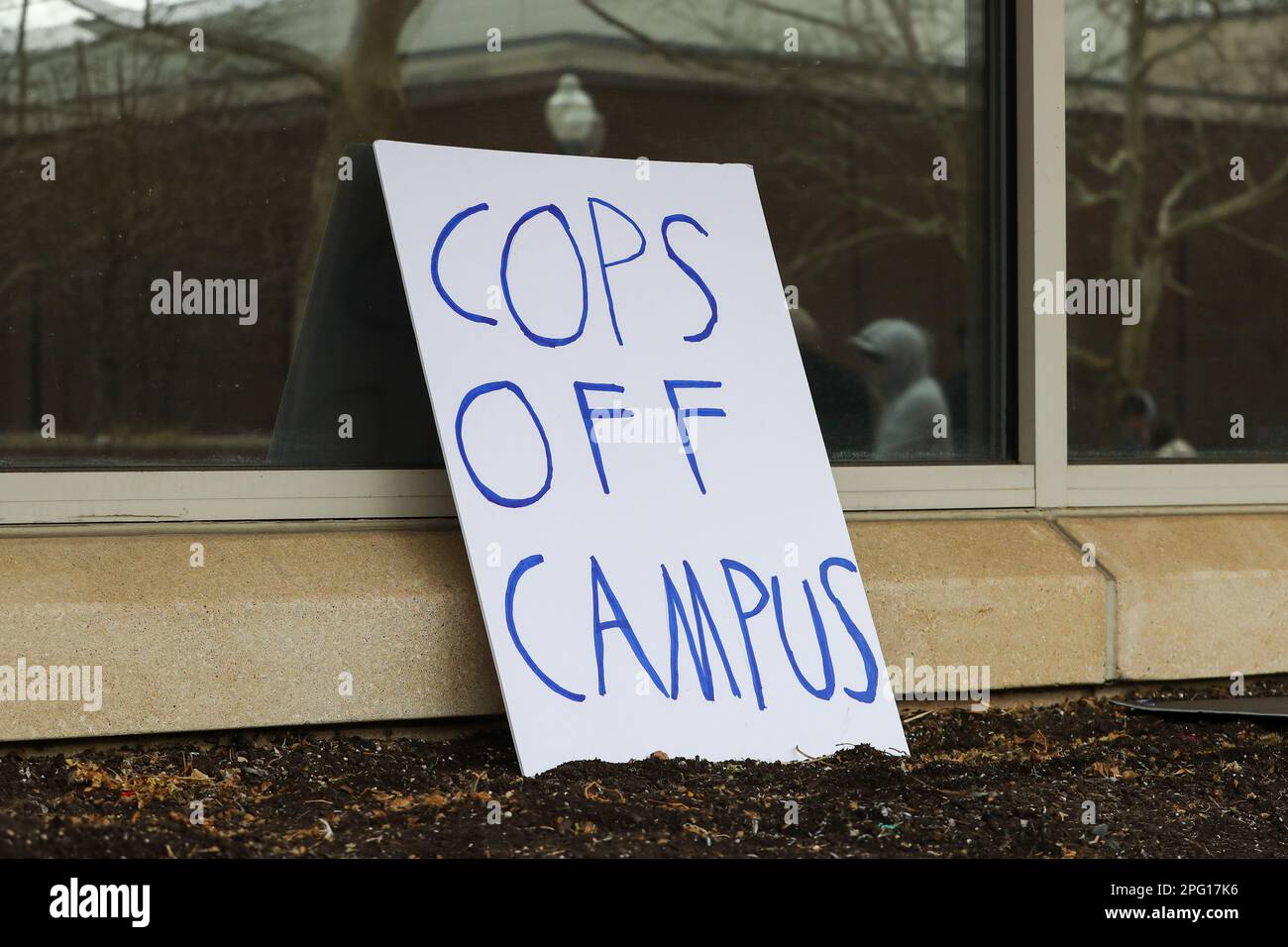 State College, United States. 19th Mar, 2023. A placard saying "cops ...