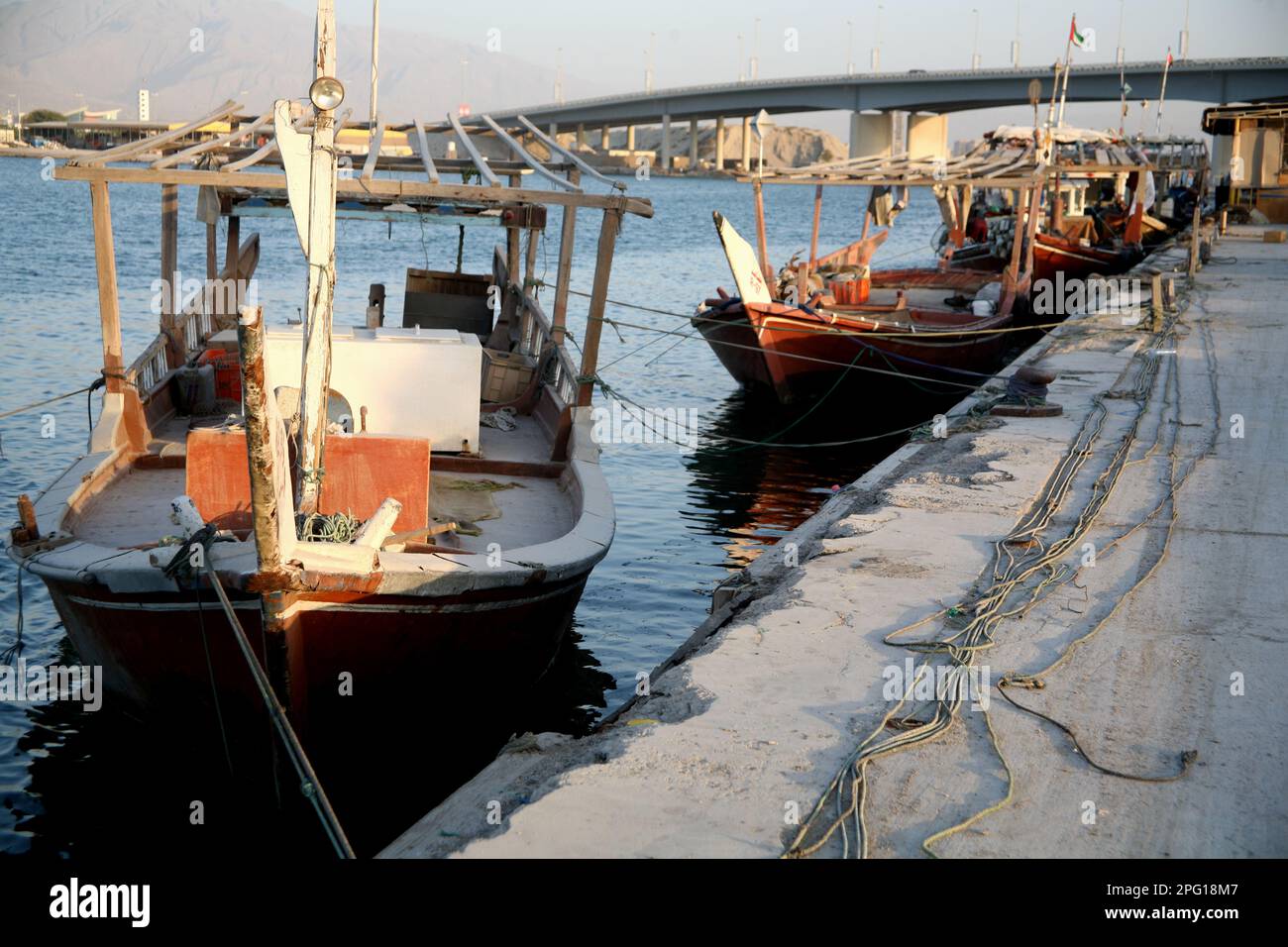 Fishing boats moored on the creek in the emirate of Ras al Khaimah, UAE ...