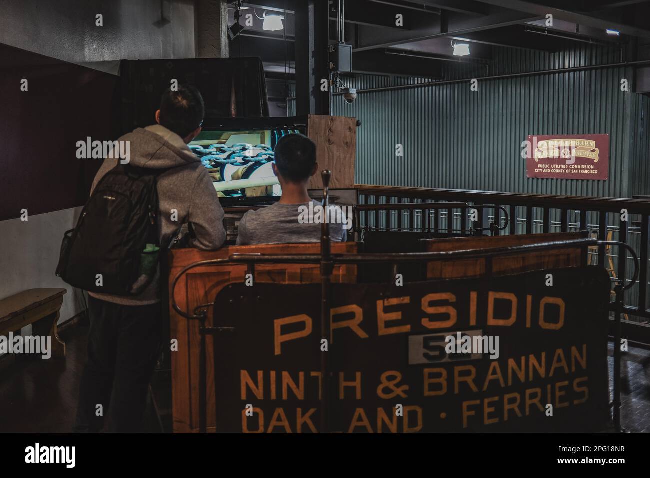 A group of visitors participating in an interactive exhibit at the San ...