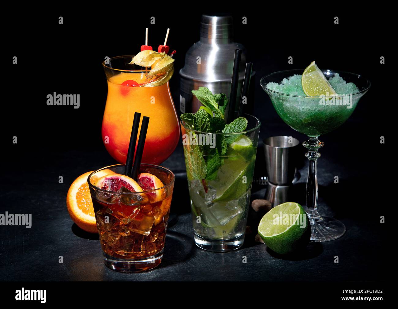 Set of various colorful cocktails on black background. Classic long ...