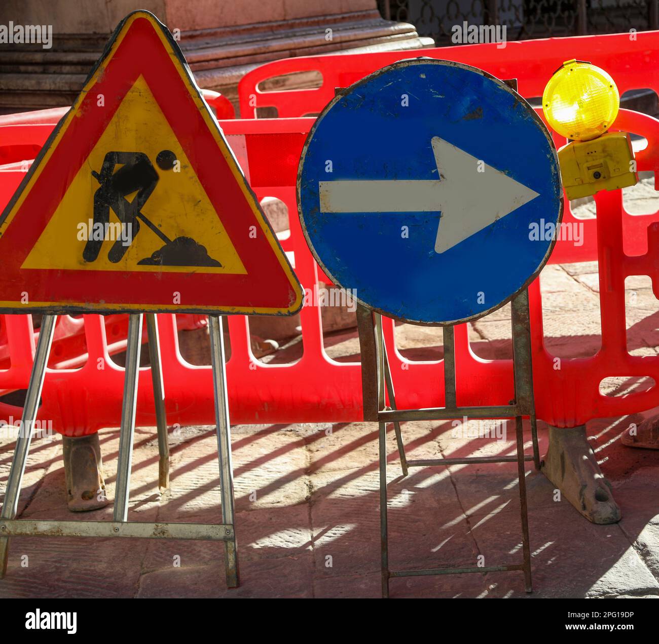 road construction site in the city and the signs with the big arrow ...