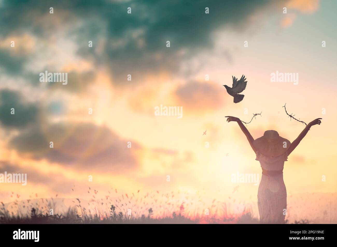 Happy woman rise hand break jail on morning view. Christian inspire ...