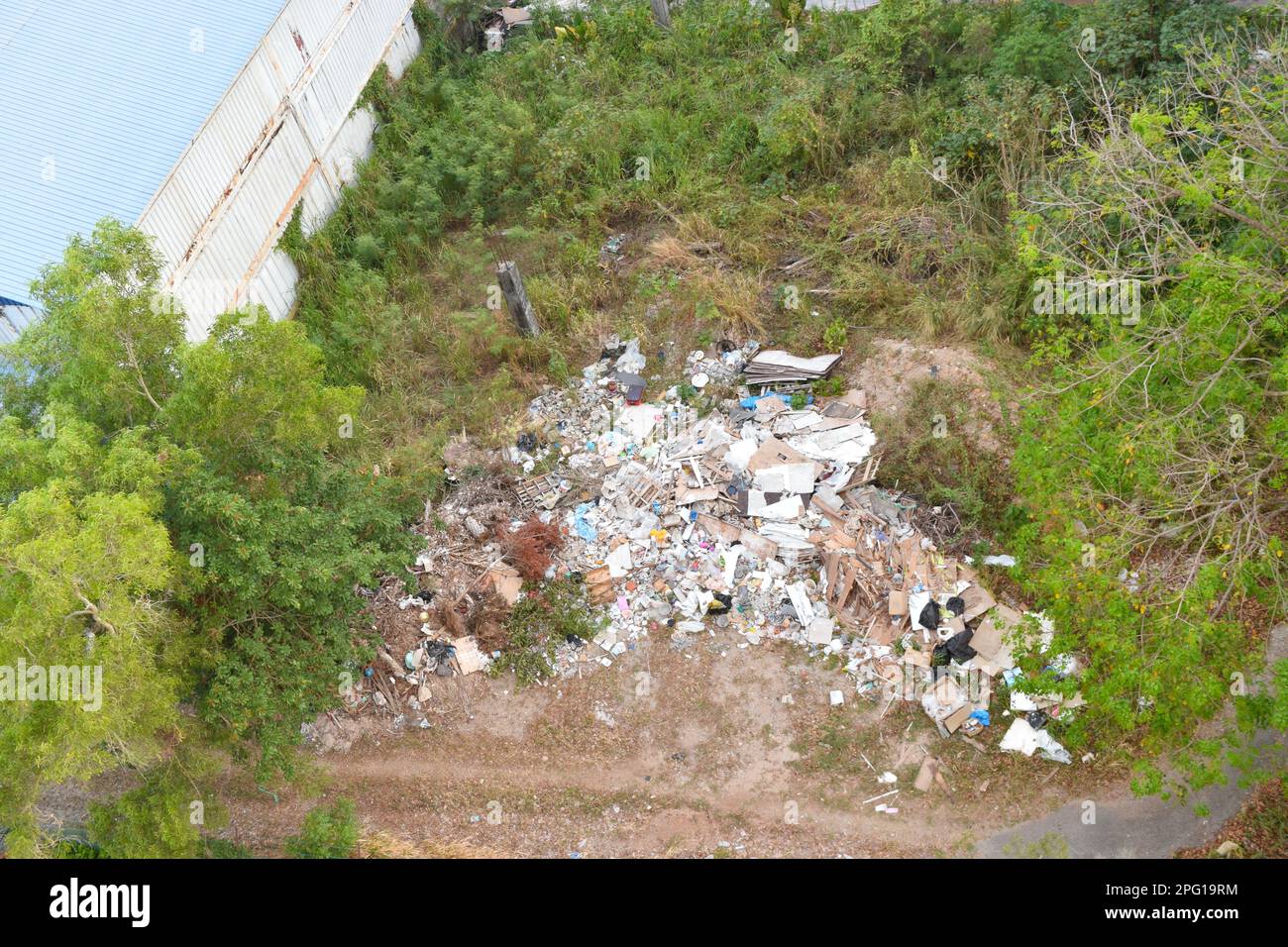 Dump on hotel back yard in Malaysia Stock Photo - Alamy