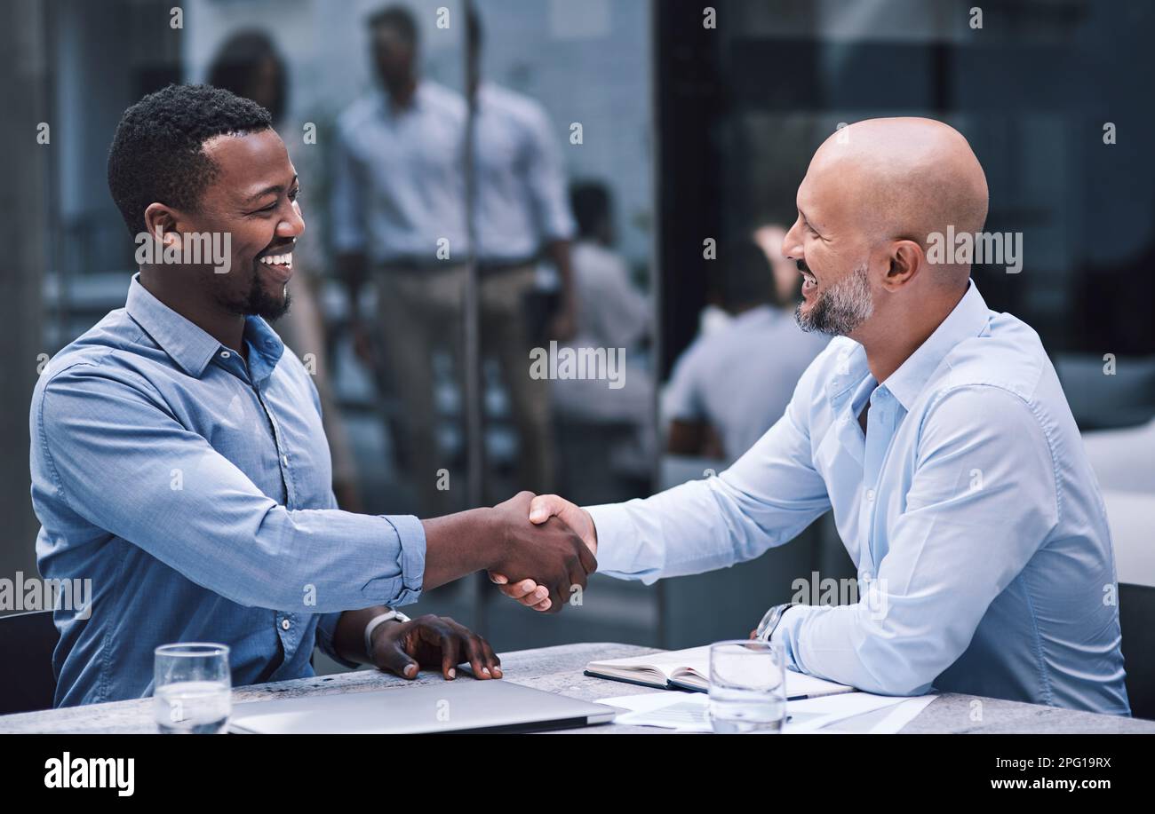 Merge with people who match your ambition. two businessmen shaking ...