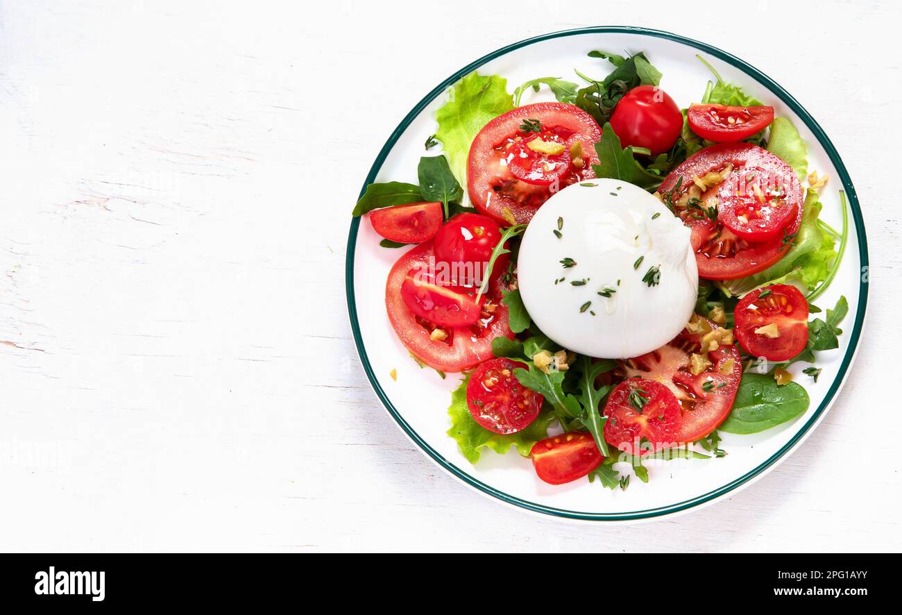Tomato, basil, mozzarella. Caprese salad with olive oil. Top view ...