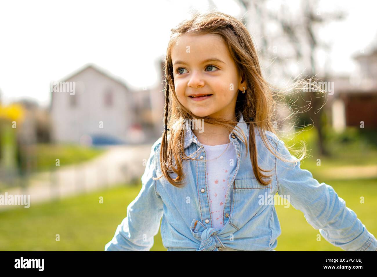 Young girl running outside in spring fresh air - Kid enjoying sunny day ...