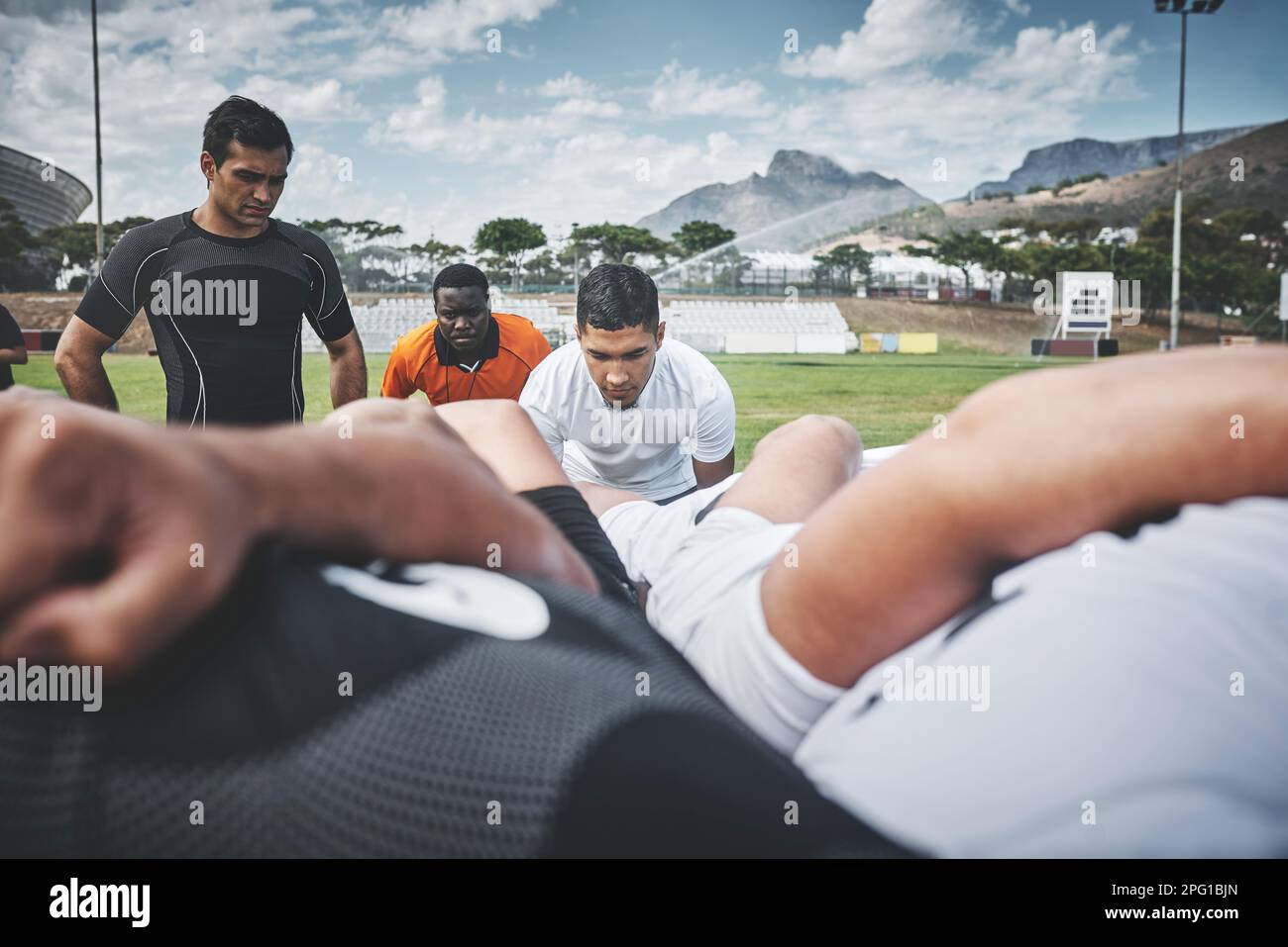 Ready to engage. two young rugby teams competing in a scrum during a ...